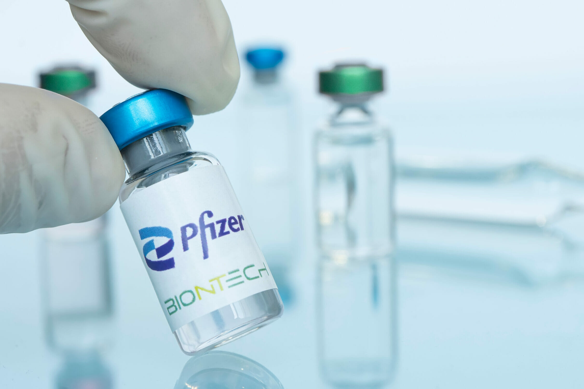 Glass,Bottle,With,Logo,Pfizer,And,Biontech,In,The,Doctor's - packaging ...
